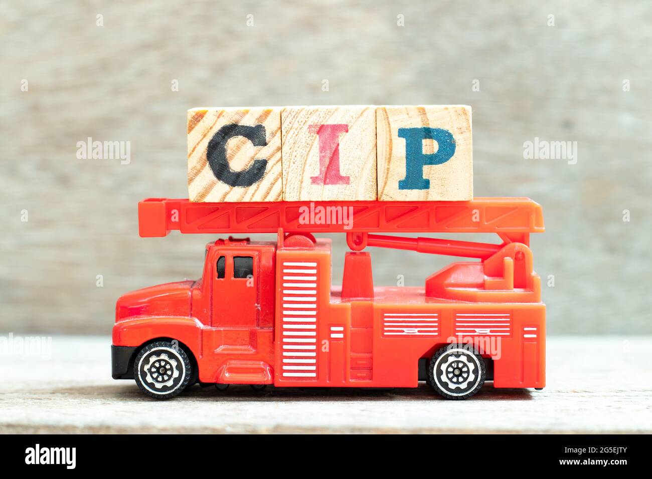 Fire ladder truck hold letter block in word CIP (Abbreviation of ...