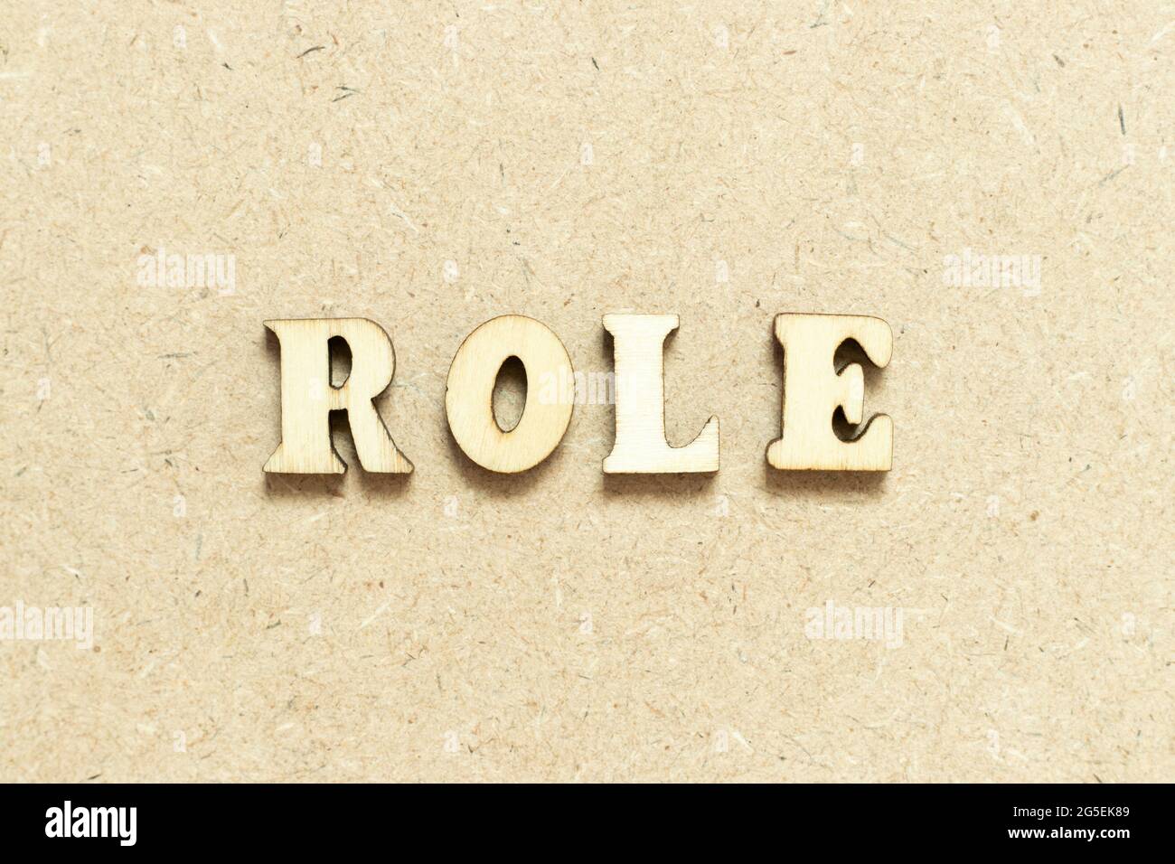 Alphabet letter in word role on wood background Stock Photo - Alamy