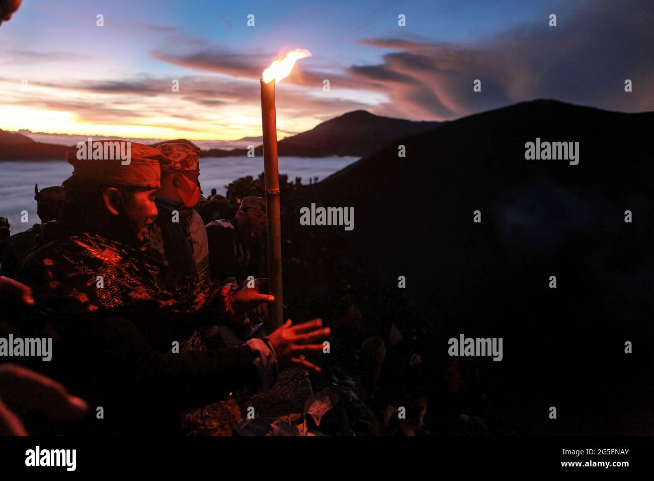 An Indonesian Hindus Tenggerese worshipper brings a torch as an ...