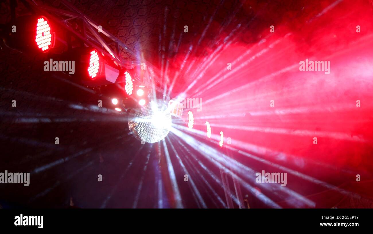 Disco ball with rays, party background Stock Photo - Alamy