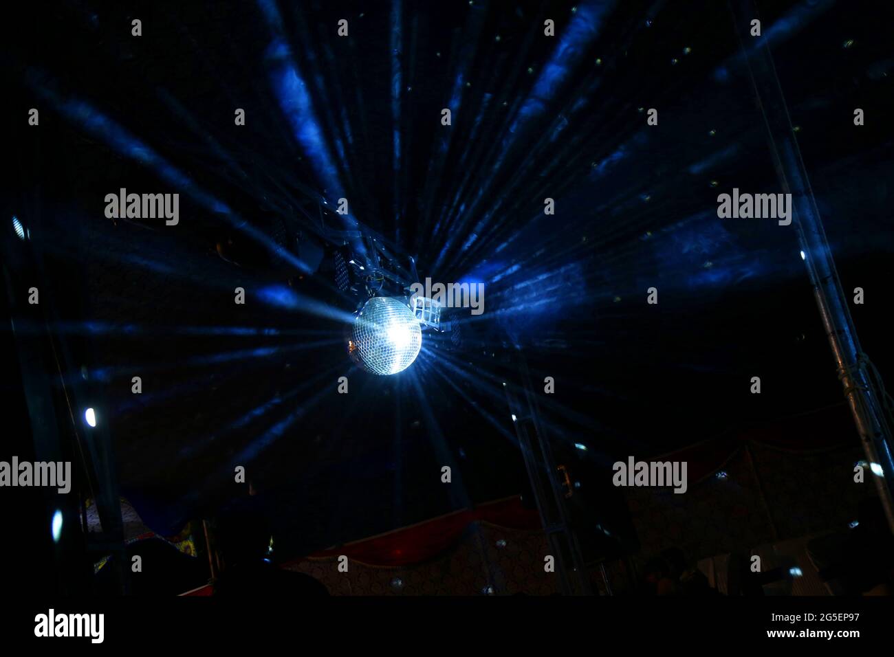 Disco ball with rays, party background Stock Photo - Alamy