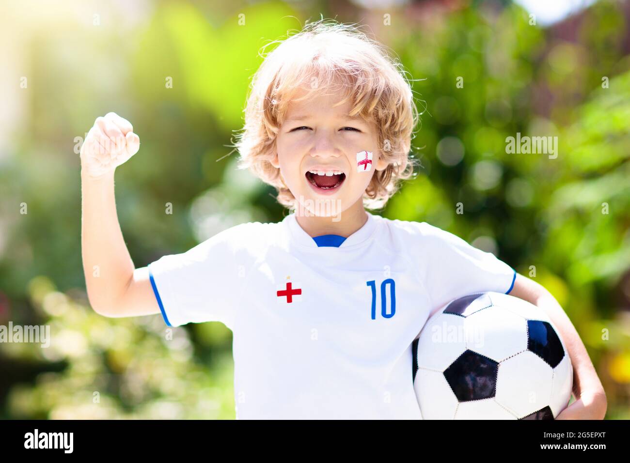 England football fan cheering. Kids play soccer and celebrate victory ...