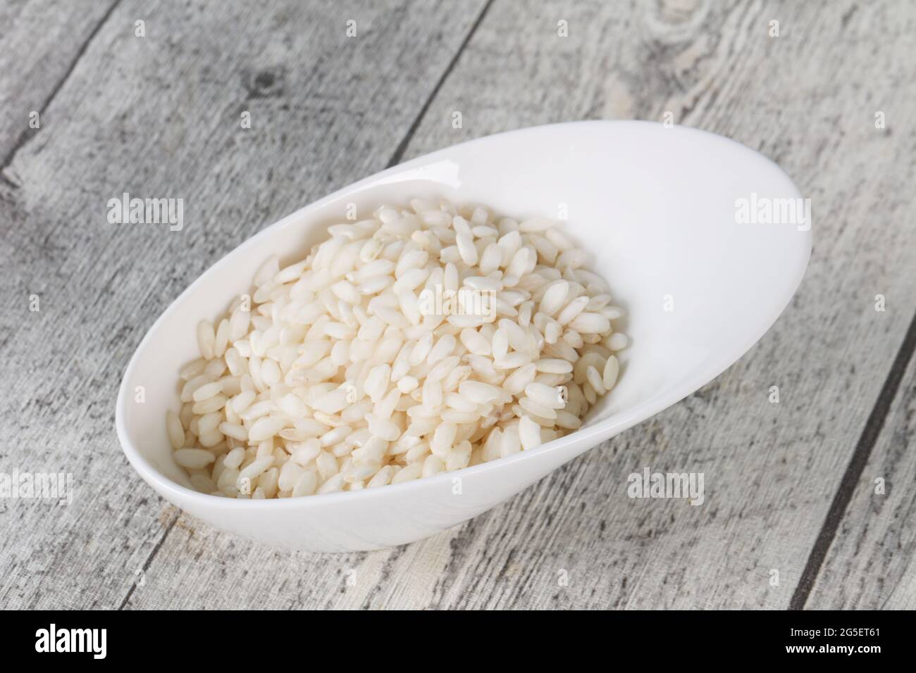 Raw Arborio rice for Italian risotto Stock Photo - Alamy