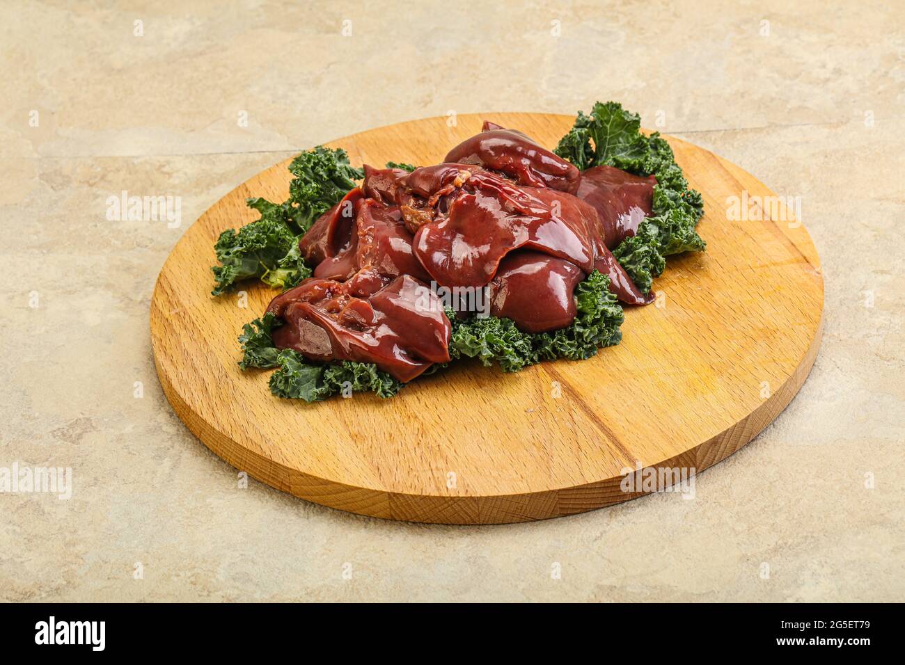 Raw chicken liver over board for cooking Stock Photo - Alamy