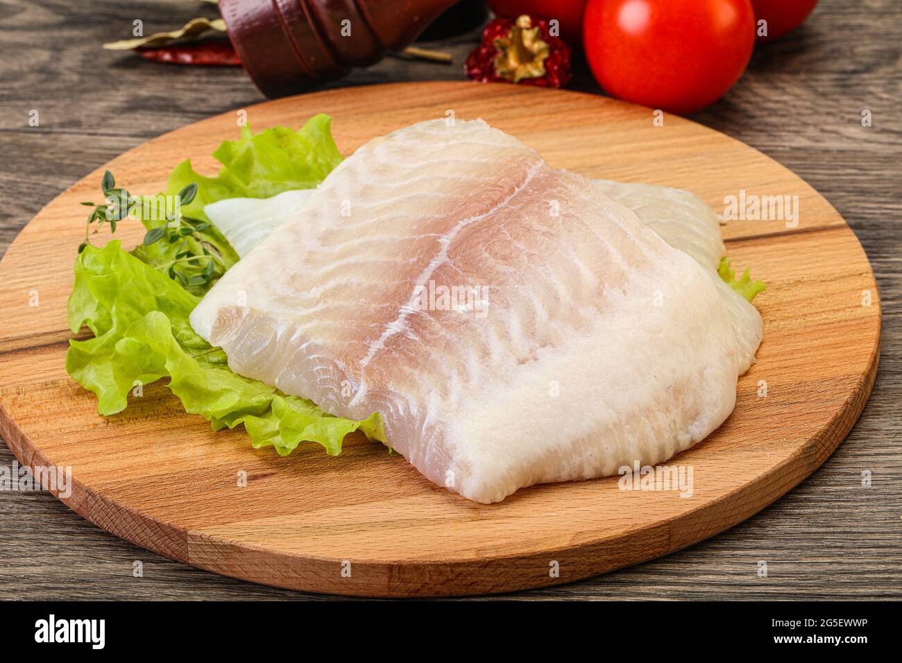 Raw pangasius fillet fish for cooking Stock Photo - Alamy