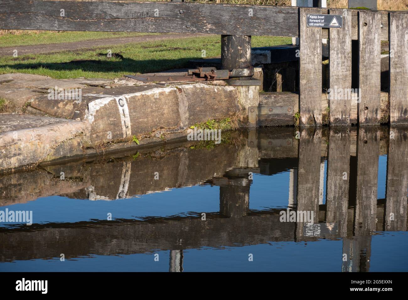 Lock gates reflected in the Leeds Liverpool canal Stock Photo - Alamy