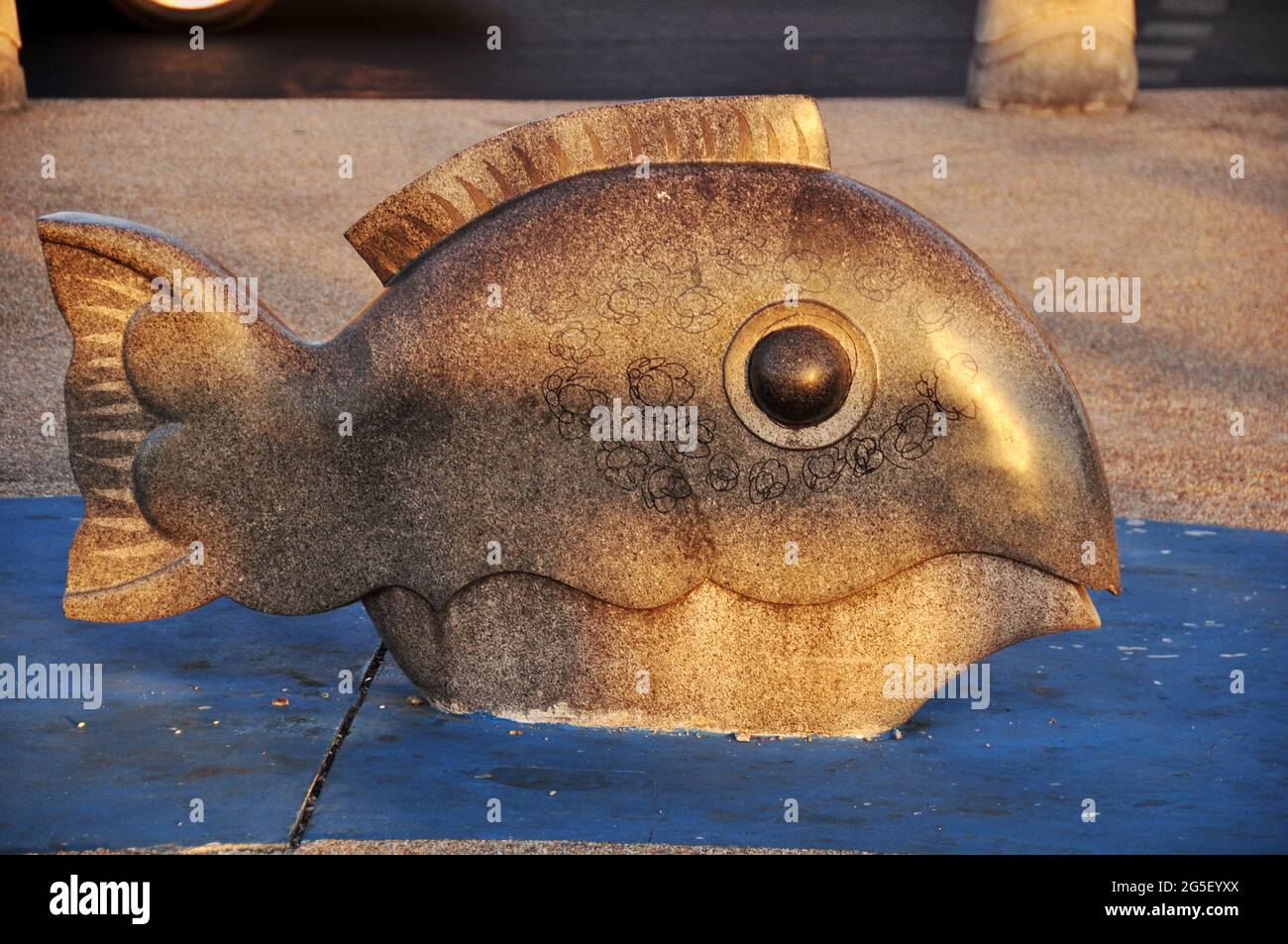 Stone marble nemo fish statue on floor at swordfish marlin statue area ...
