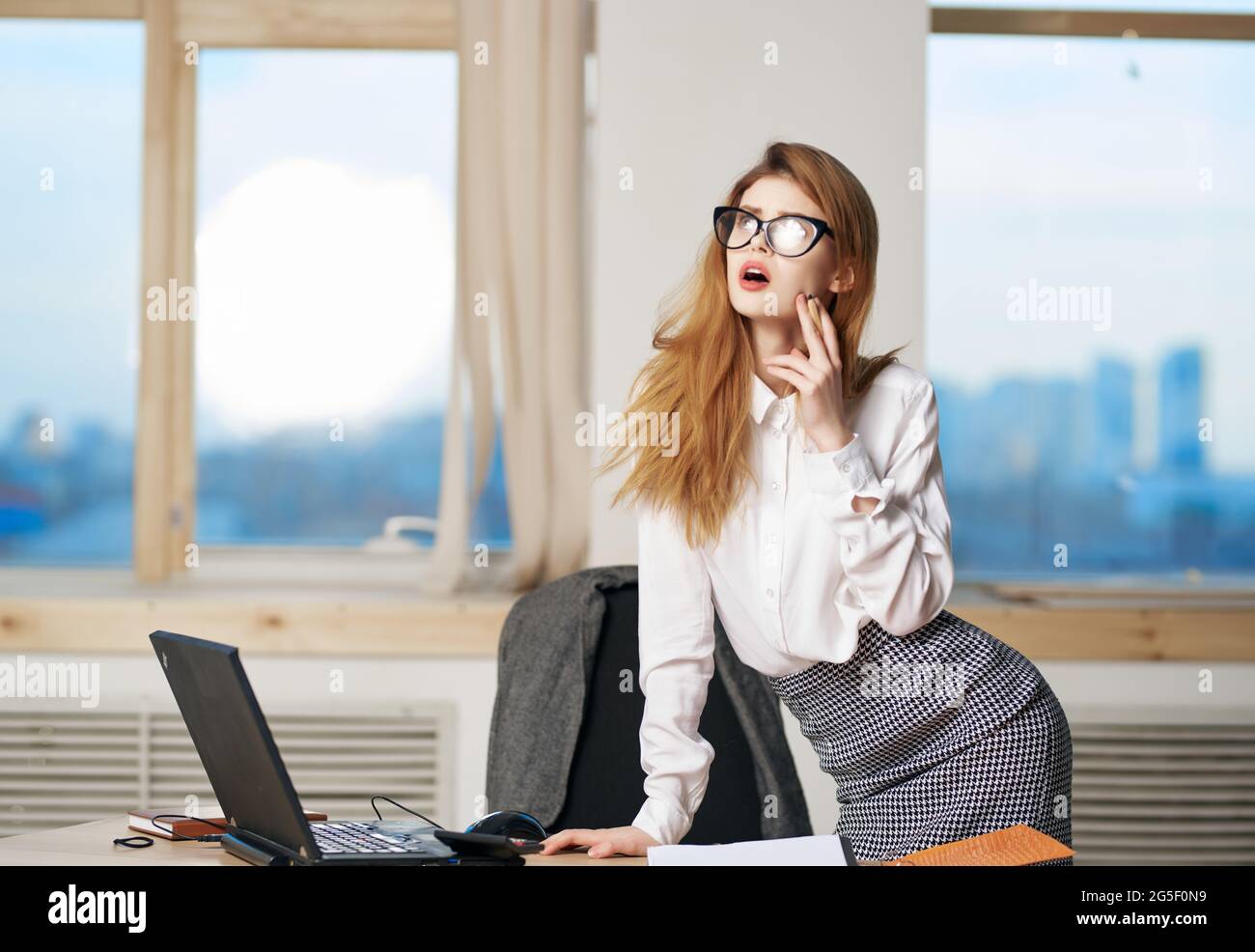 woman secretary office desk laptop technology Stock Photo - Alamy