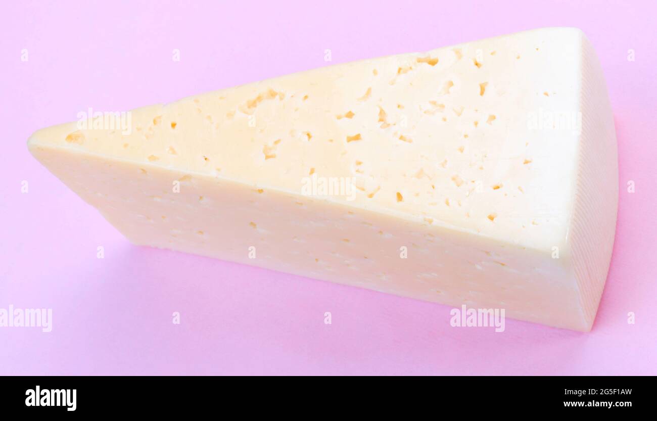 Cheese on Pink Background Stock Photo - Alamy