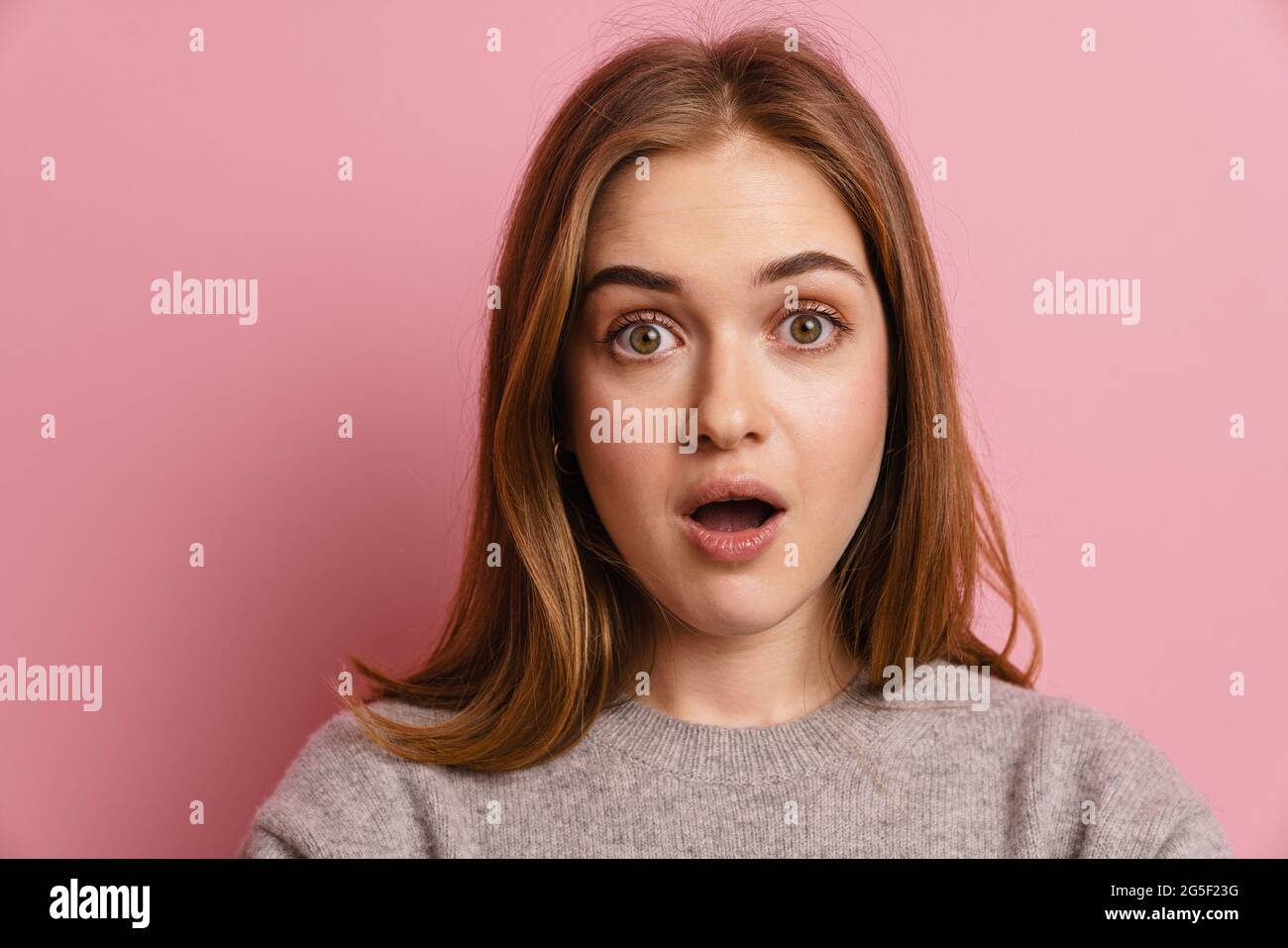 Ginger young shocked woman hi-res stock photography and images - Alamy
