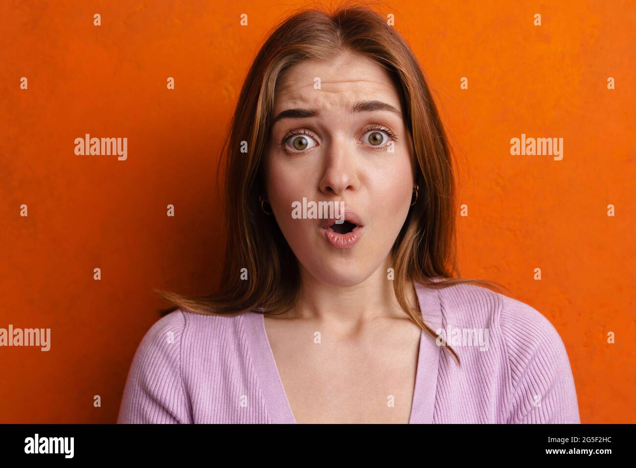 Woman expressing surprise hi-res stock photography and images - Alamy