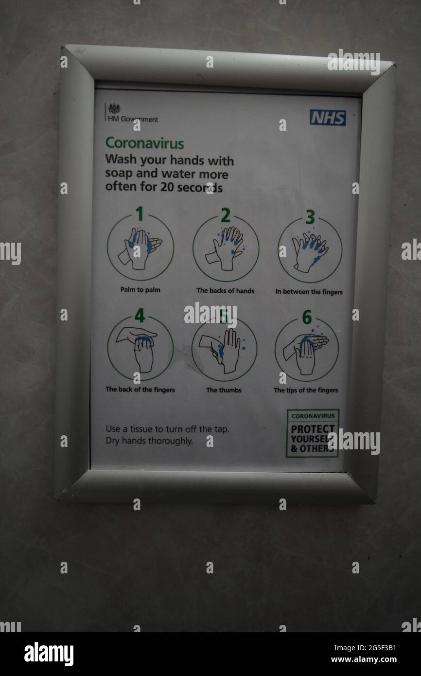 Now wash your hands sign hi-res stock photography and images - Alamy