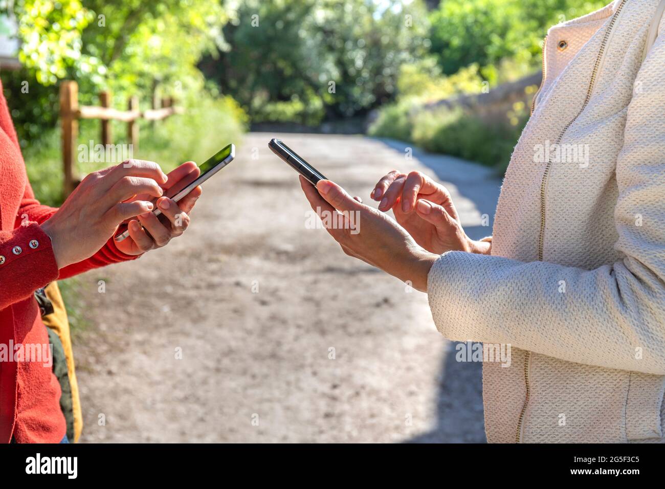 Using two hands hi-res stock photography and images - Alamy