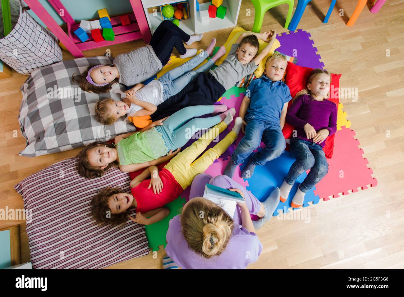 Boy laying on mat hi-res stock photography and images - Alamy