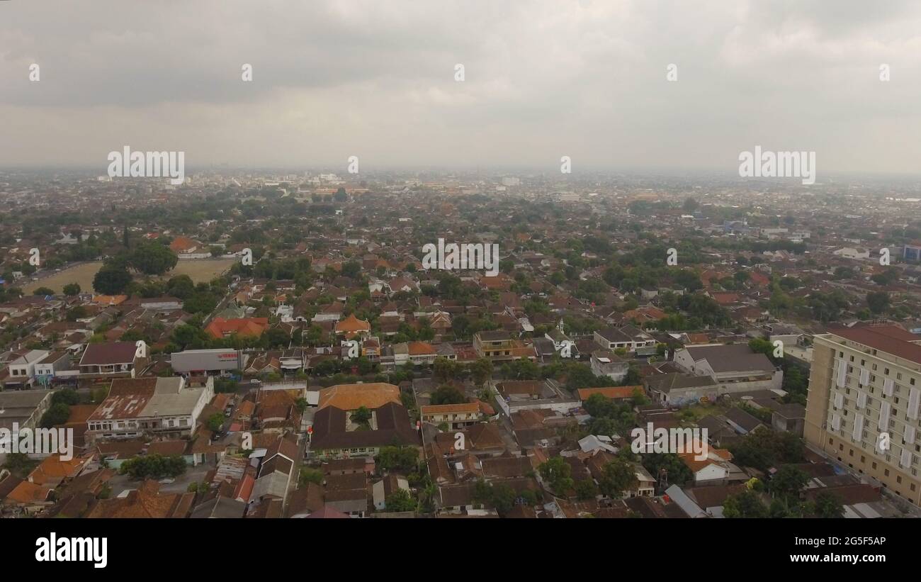 cityscape Yogyakarta with buildings, highway at sunset time. aerial ...