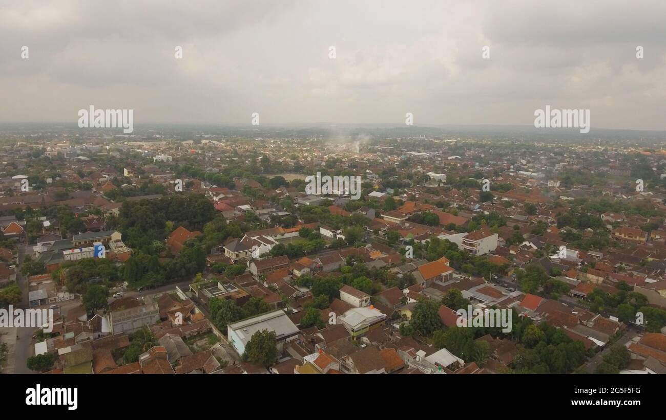 cityscape Yogyakarta with buildings, highway at sunset time. aerial ...