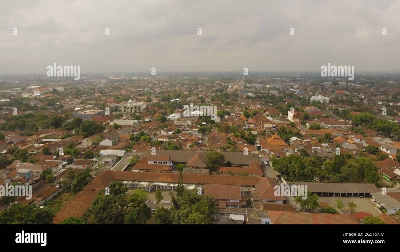 cityscape Yogyakarta with buildings, highway at sunset time. aerial ...