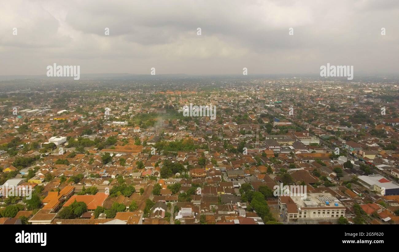 cityscape Yogyakarta with buildings, highway at sunset time. aerial ...