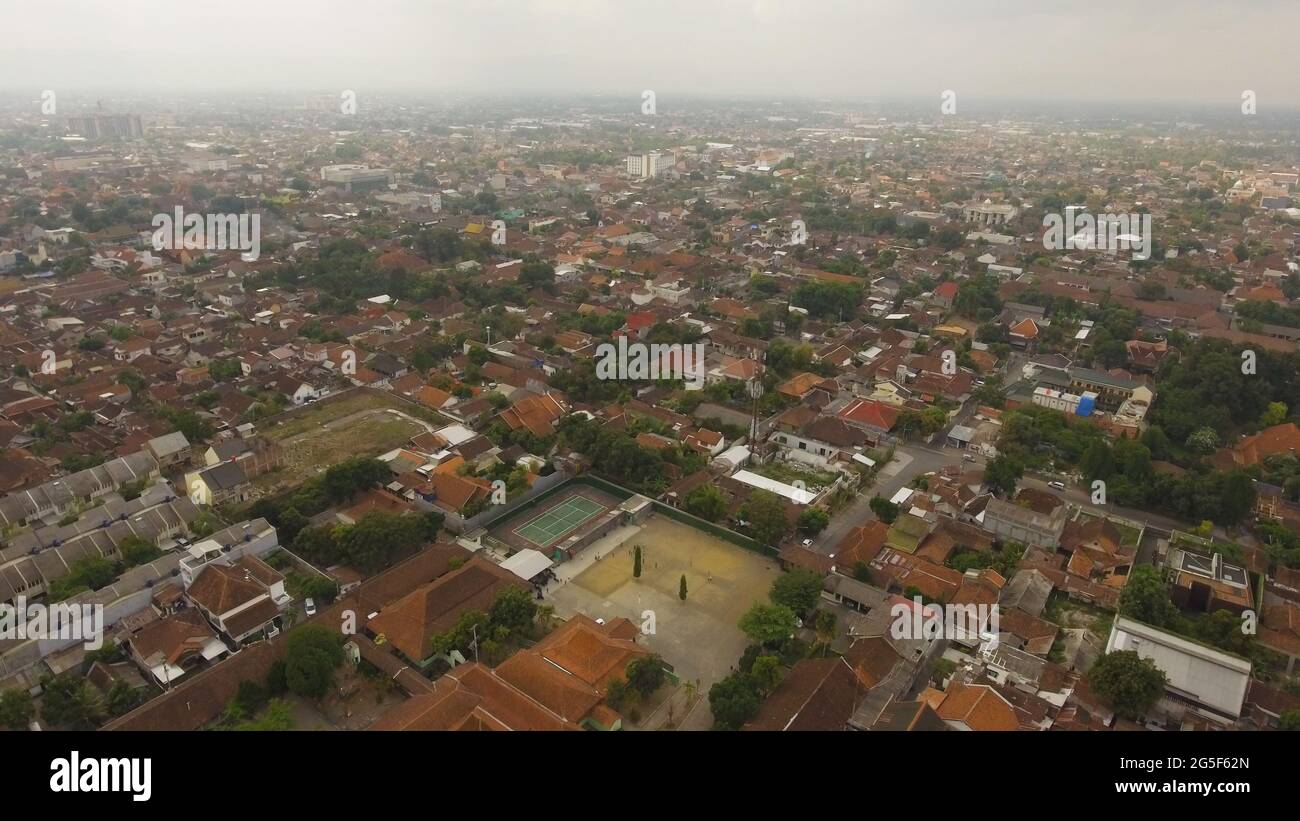 cityscape Yogyakarta with buildings, highway at sunset time. aerial ...