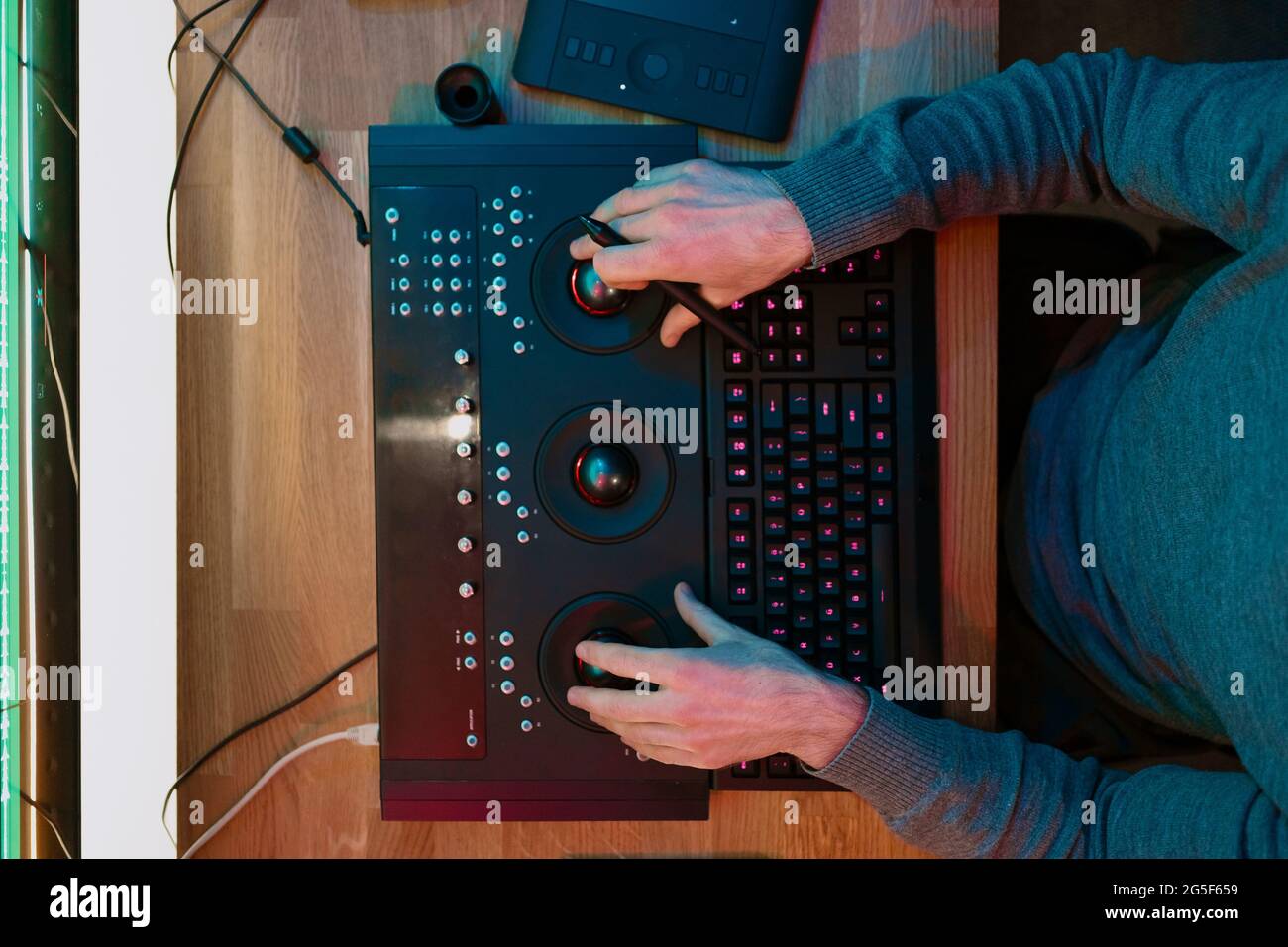Male Video Editor hands Works with Footage or Video on His control ...