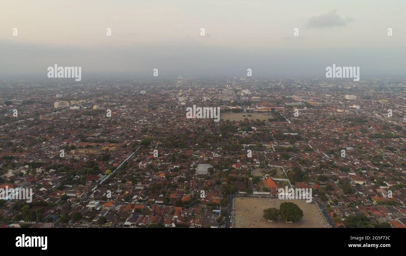 cityscape Yogyakarta with buildings, highway at sunset time. aerial ...