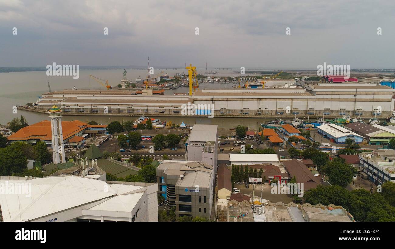 aerial view cargo and passenger seaport with ships and crane Tanjung ...