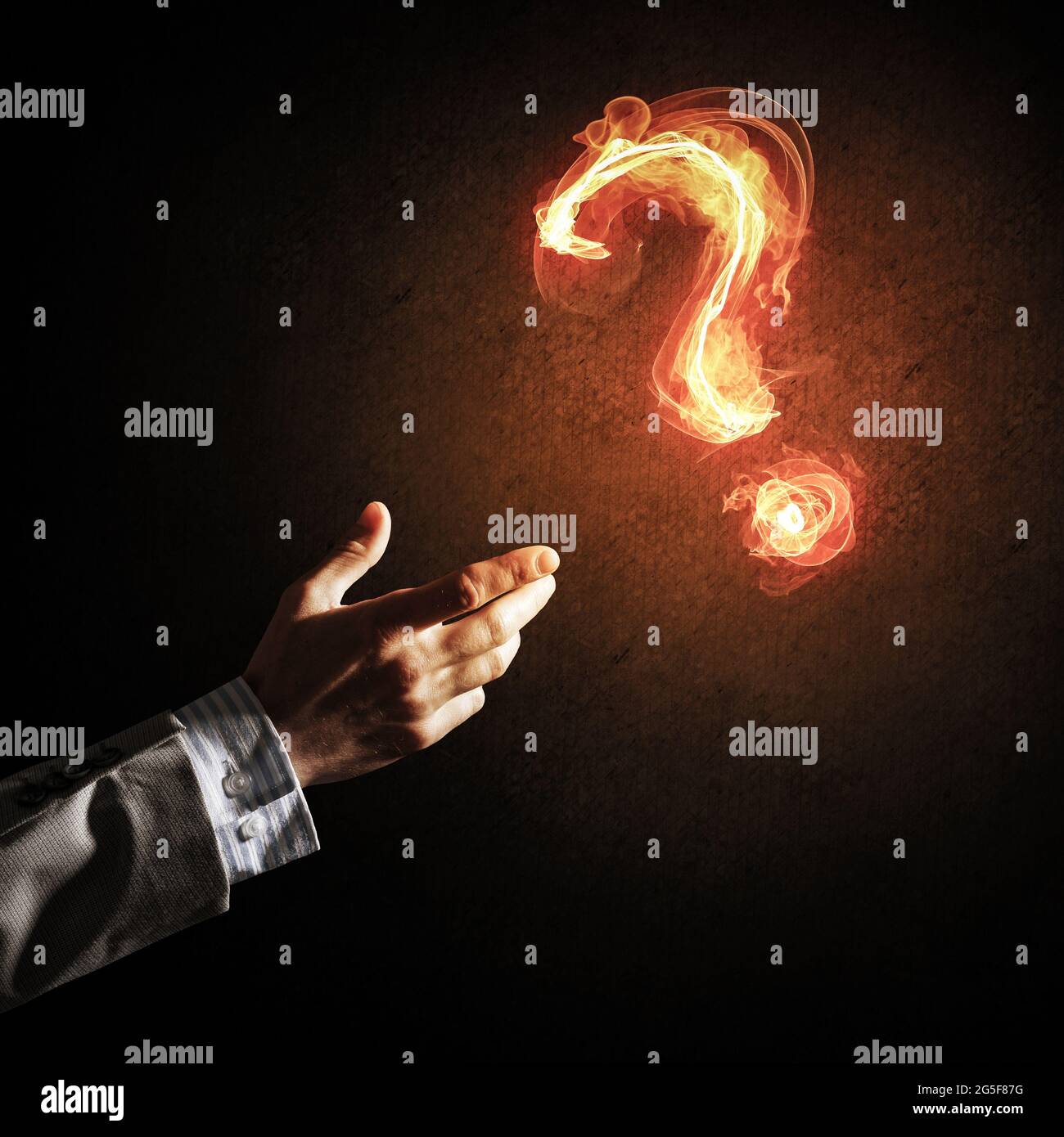 Concept of help or support with fire burning question mark Stock Photo ...