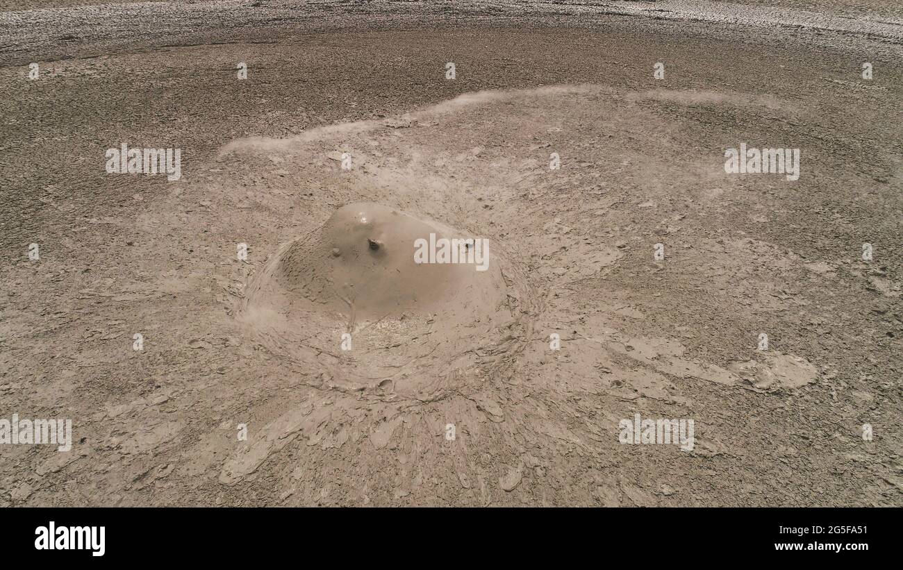 Mud volcano with bursting bubble bledug kuwu. aerial view volcanic ...