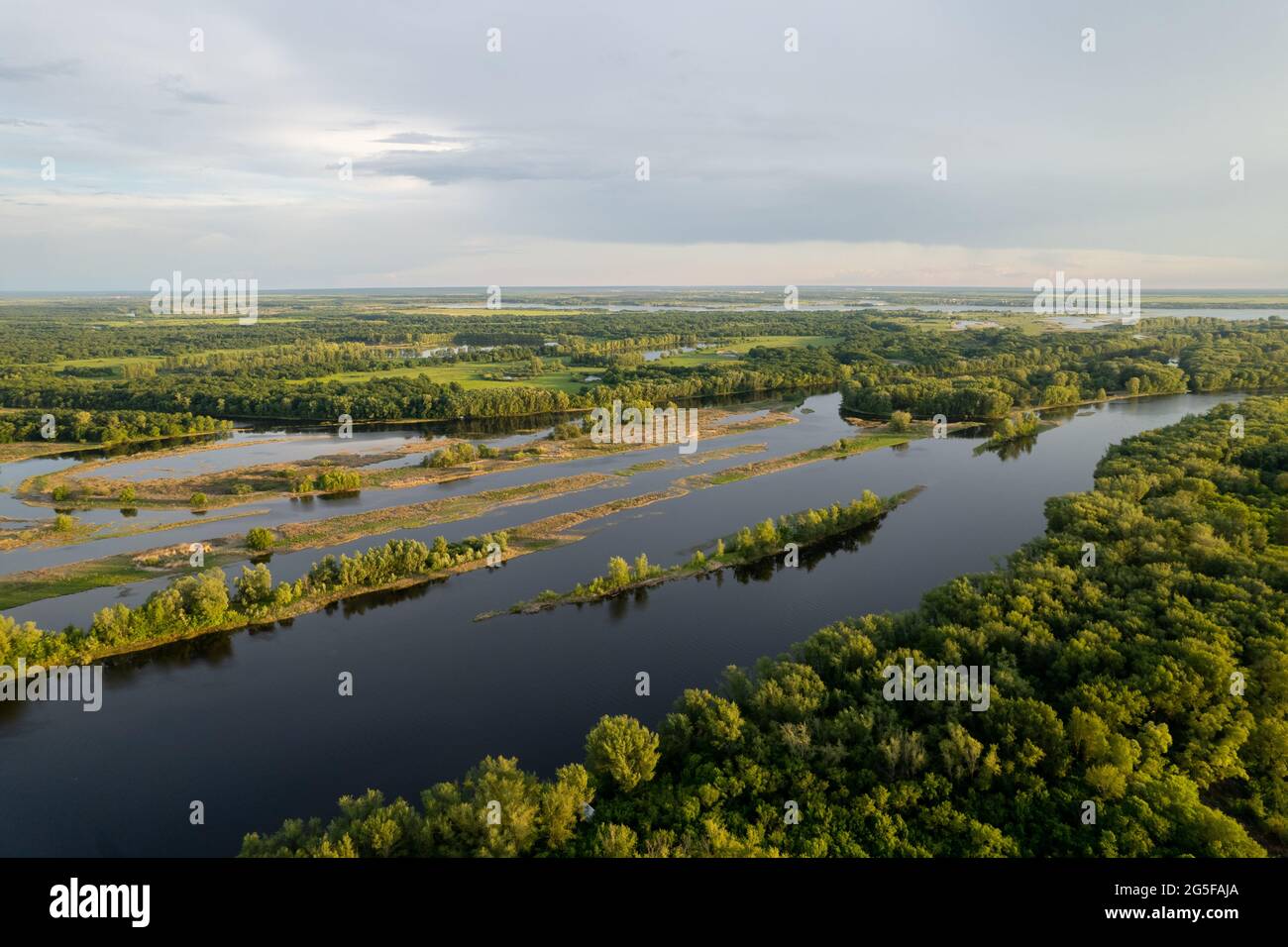 River Volga with islands, branch, girt with fishing boats and camps ...