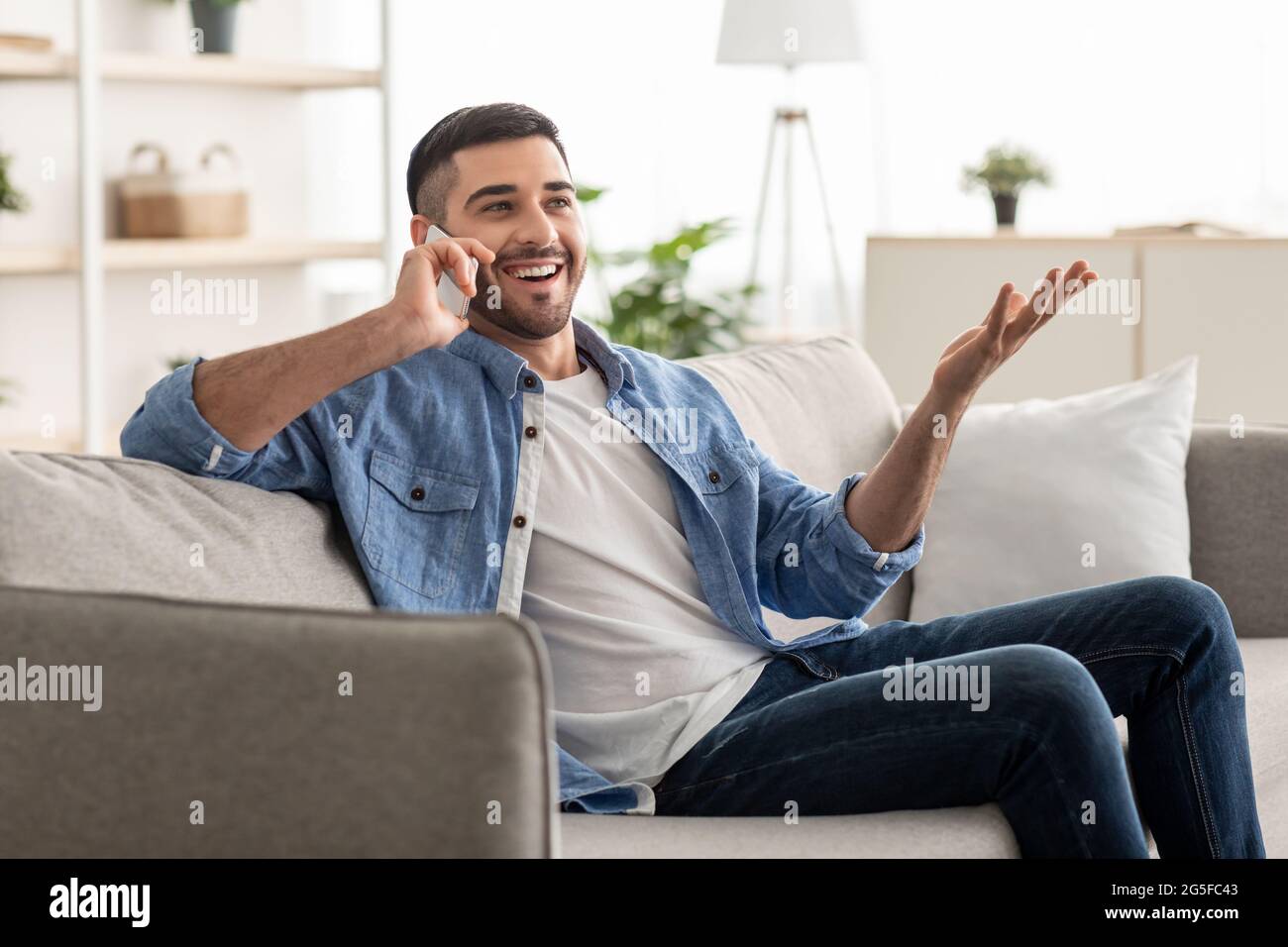 Distance Communication Concept. Portrait of excited smiling young ...