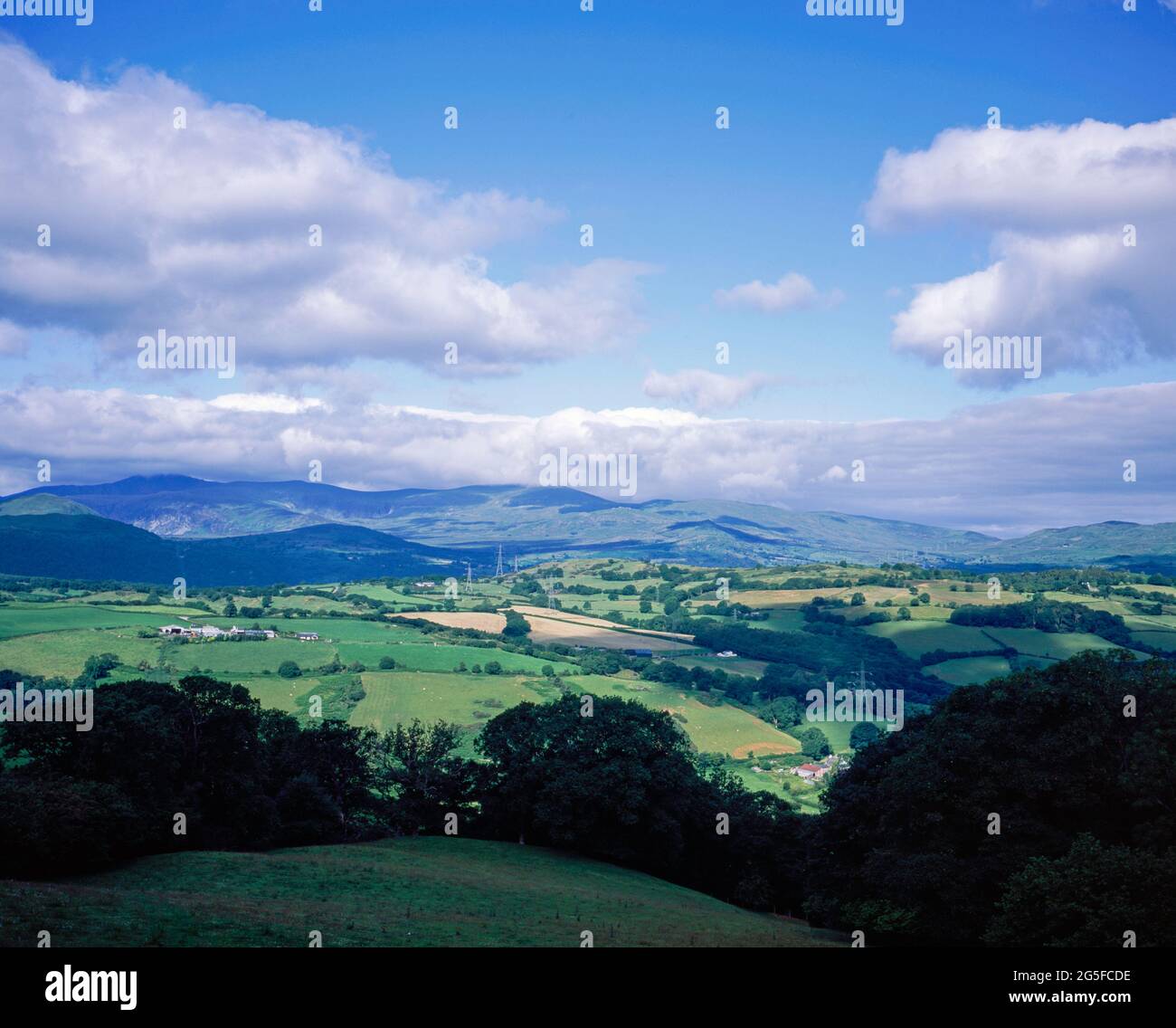 Summer morning the Conwy Valley viewed from hills above the village of ...