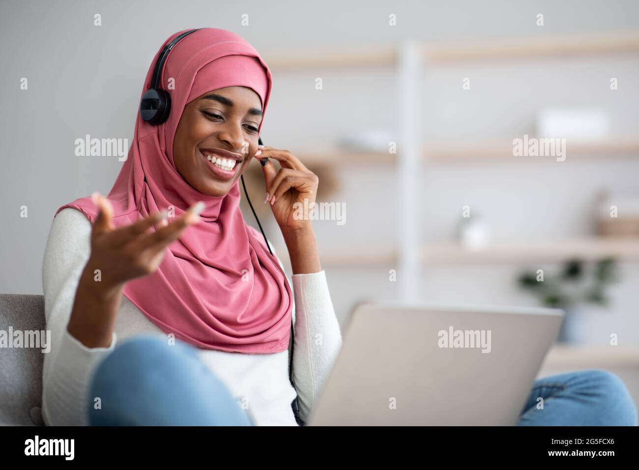 Distance Communication. Cheerful Black Islamic Lady In Hijab And ...