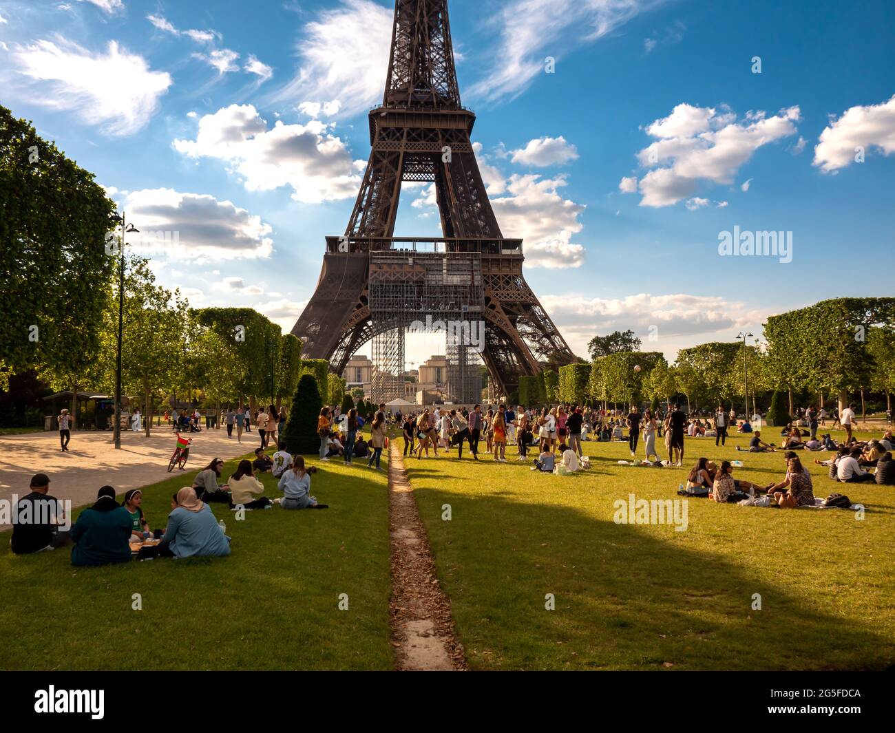 Paris, FRANCE - May 2021: Park in front of the Eiffel Tower, a symbol ...