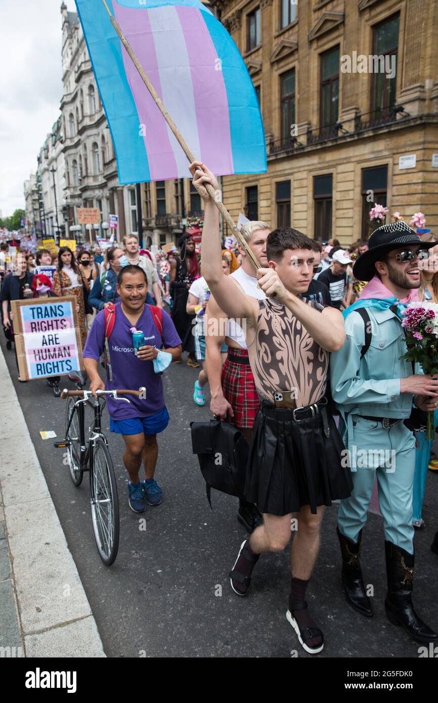 London, UK. 26th June, 2021. Thousands of people take part in a London ...