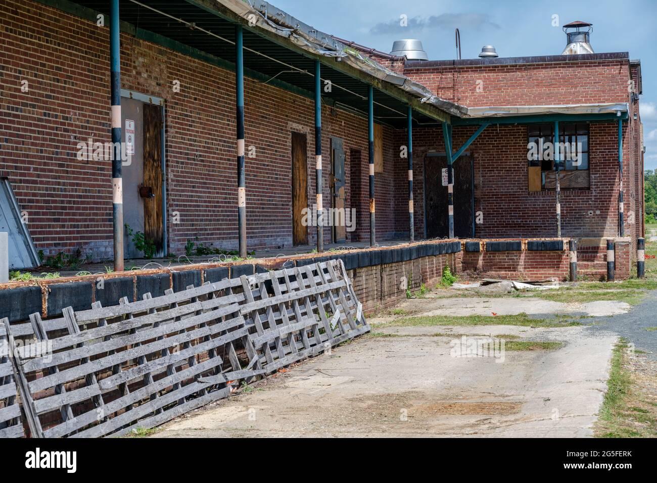 Lorton, VA, USA — June 25, 2021. Photo of dilapidated factory building ...