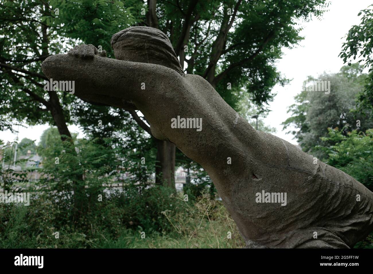 Leaning Woman Sculpture Stock Photo - Alamy