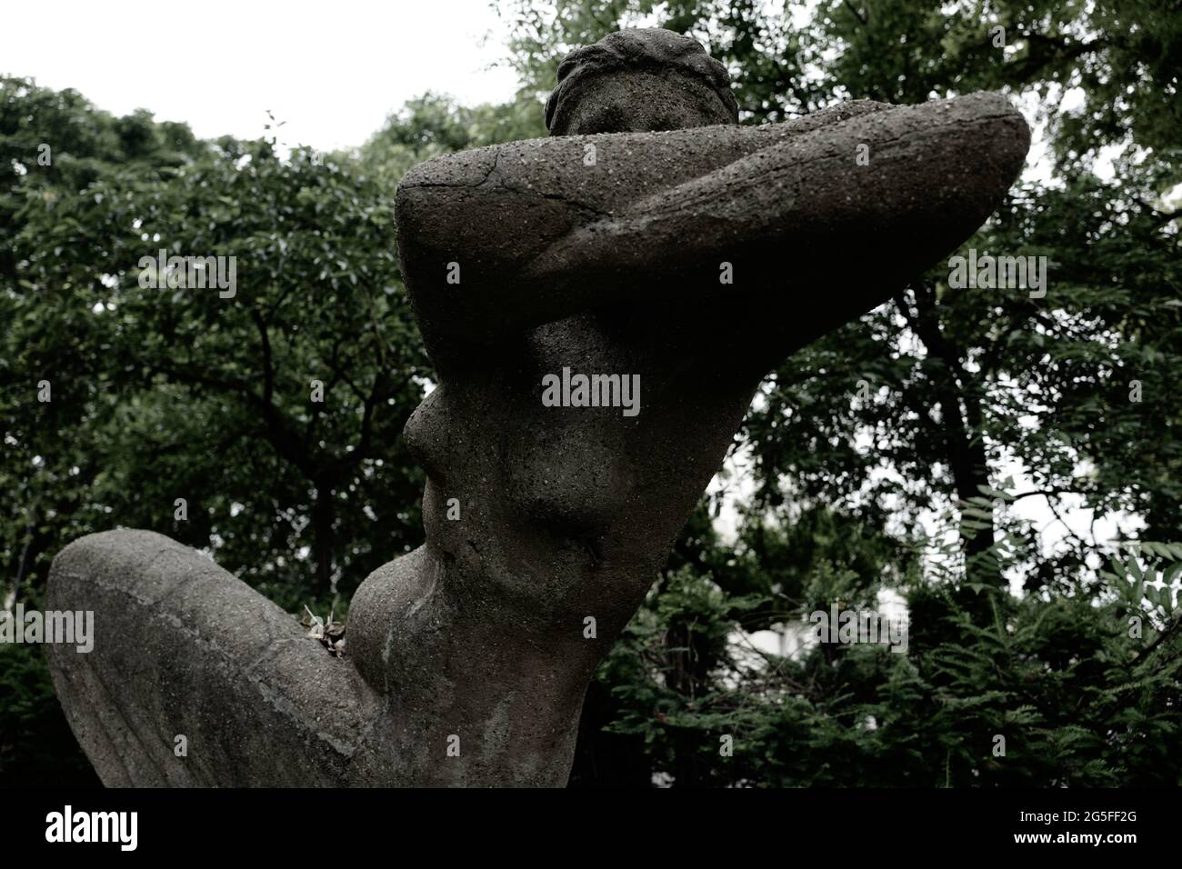 Leaning Woman Sculpture Stock Photo - Alamy