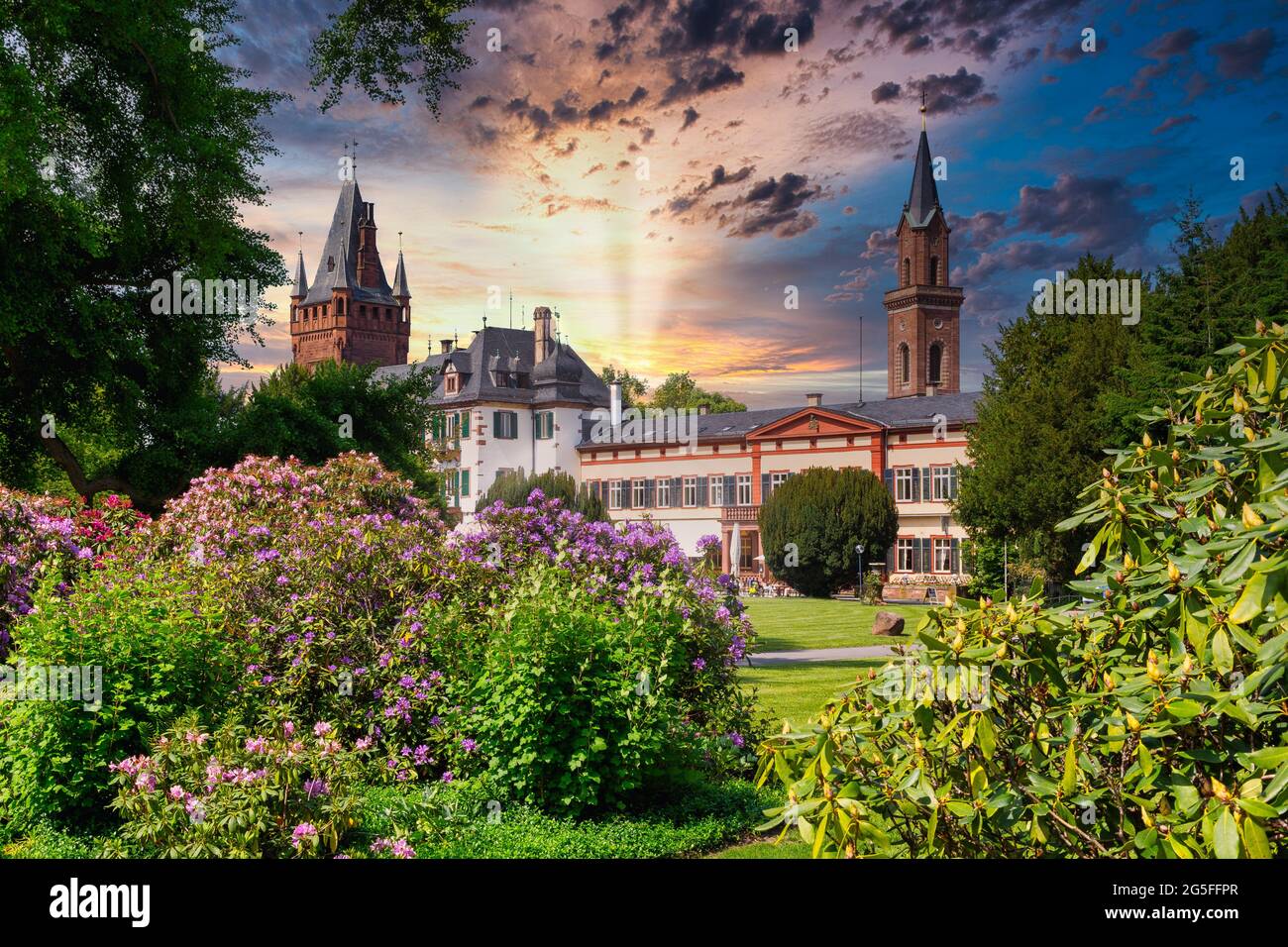 Weinheim castle park Old Town view during sunset with sun flare, hessen ...