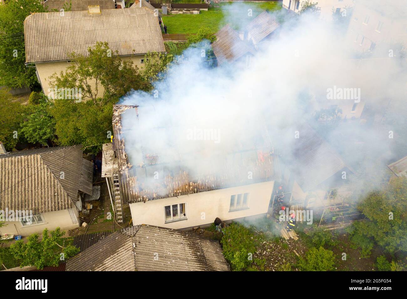 Aerial view house on fire hi-res stock photography and images - Alamy