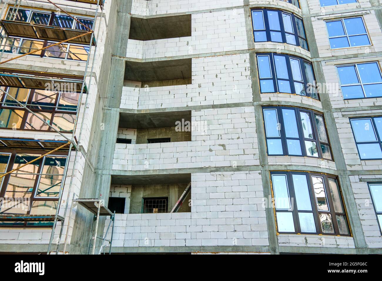Aerial view of high residential apartment building under construction ...