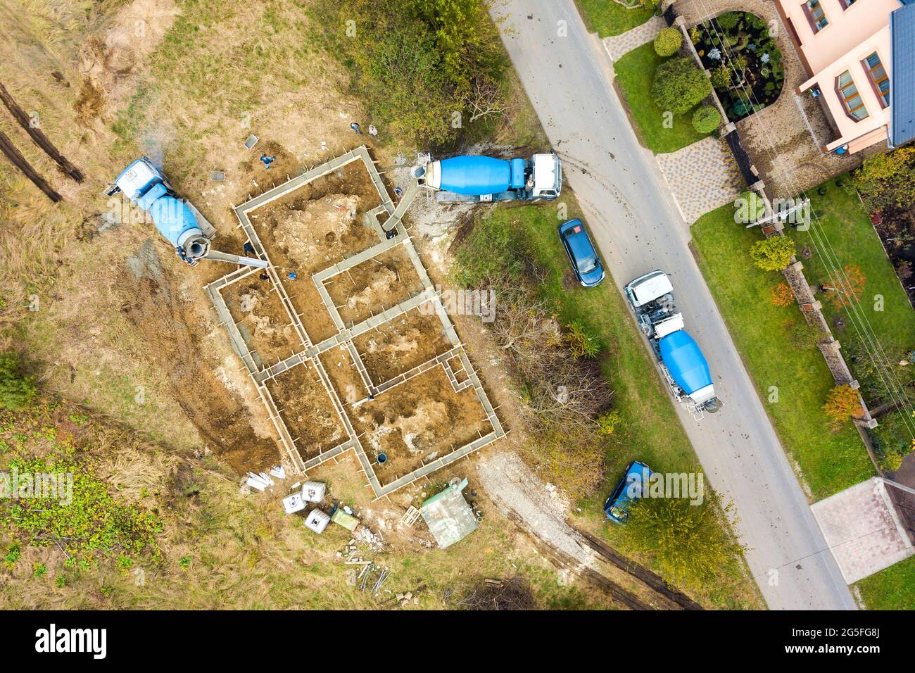 Top down aerial view of construction works of new house concrete ...