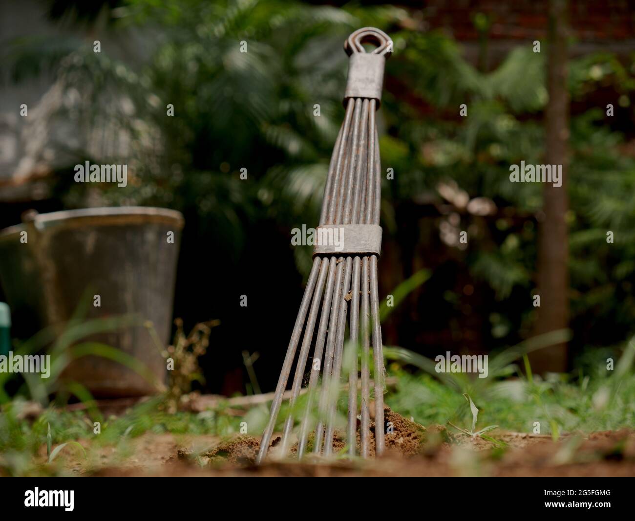 A sand collector tool on the land in the natural green field Stock ...