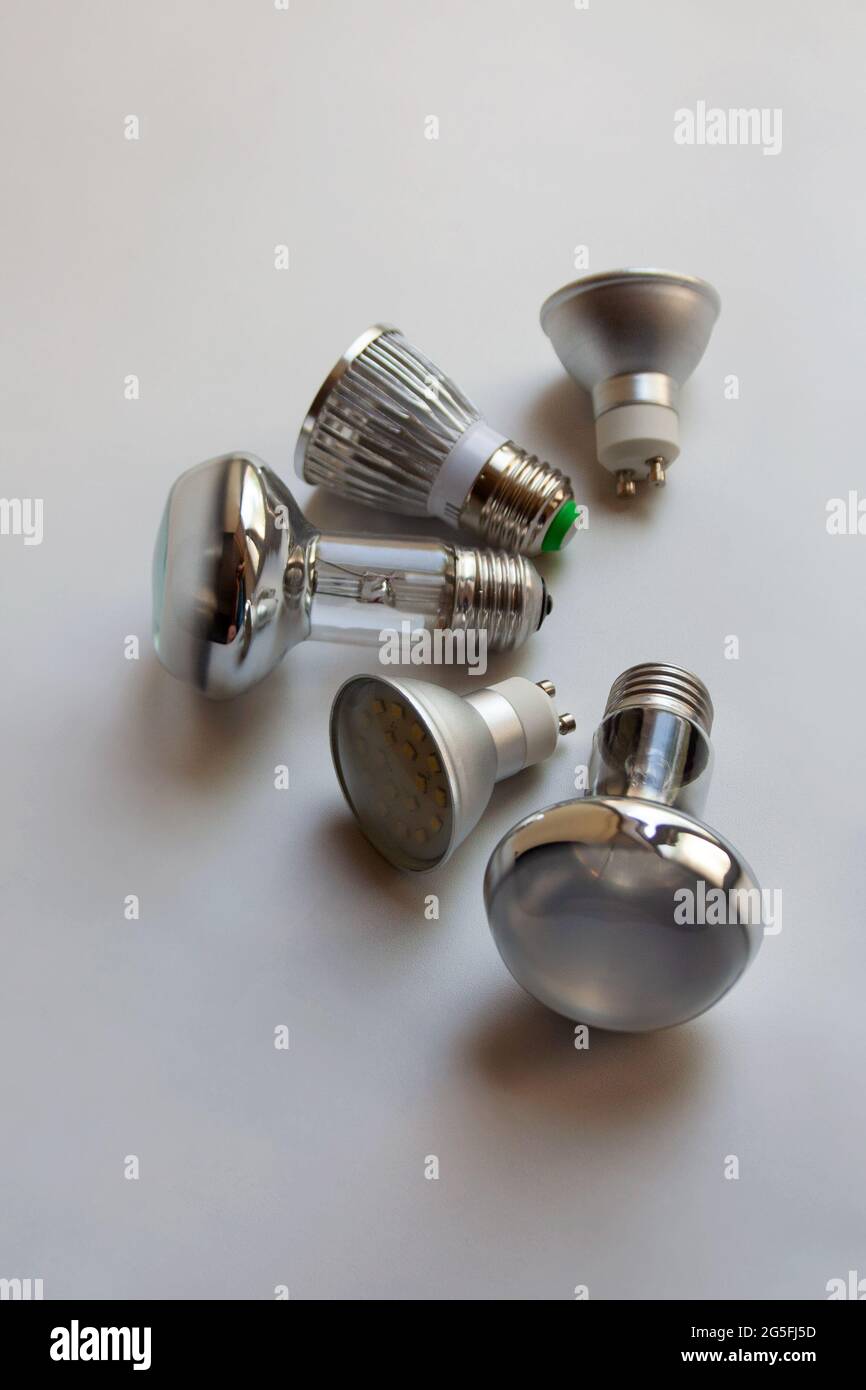 Silver electric light bulbs isolated on white background Stock Photo ...