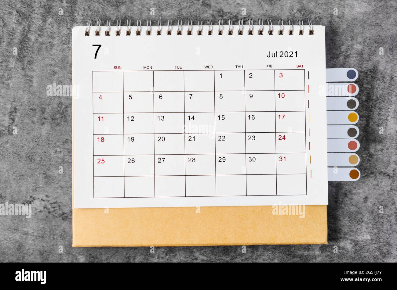 July Calendar 2021 with sticky note on wooden table background Stock ...