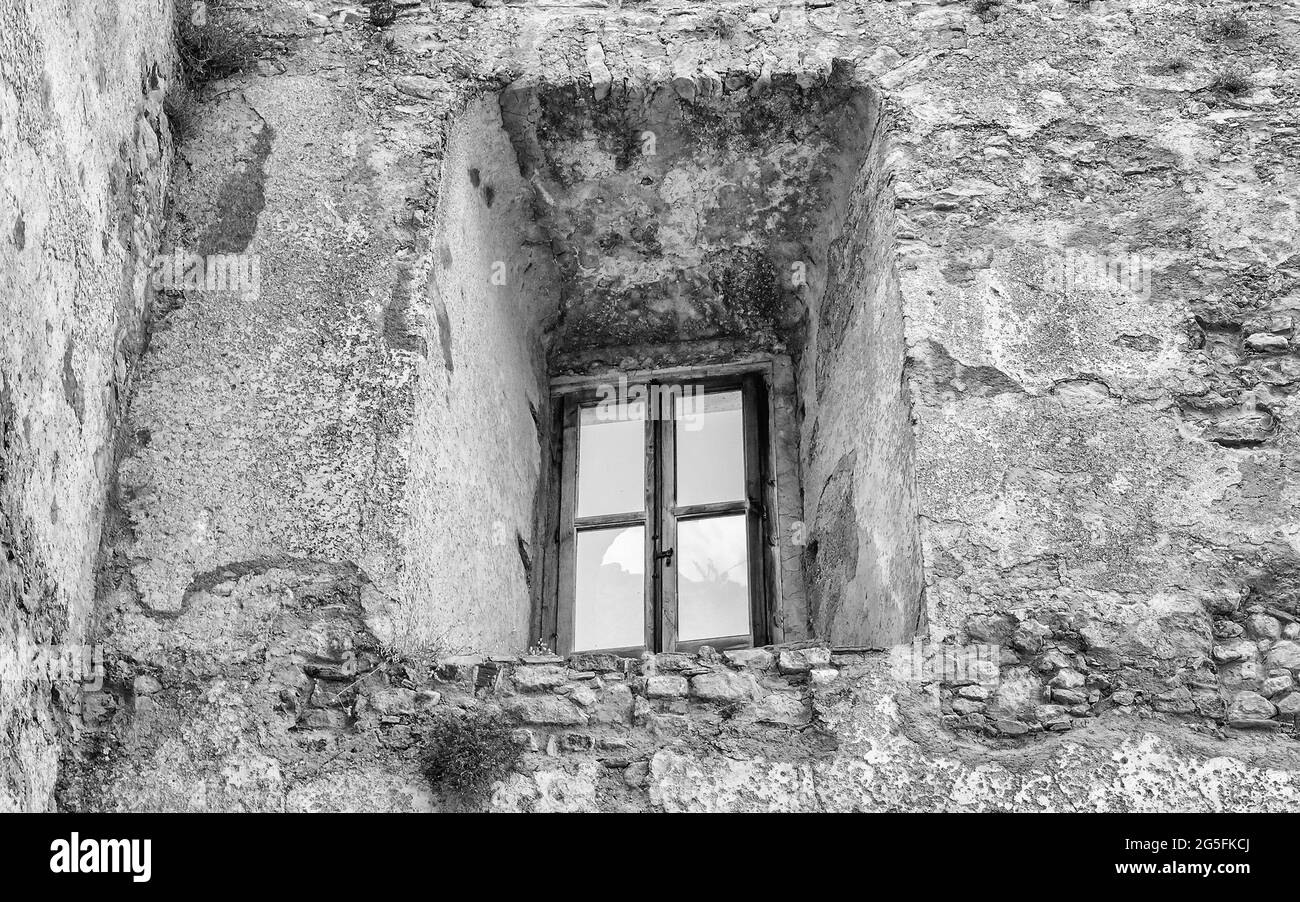 Ancient window from the ruins of an old castle in Fiumefreddo Bruzio ...