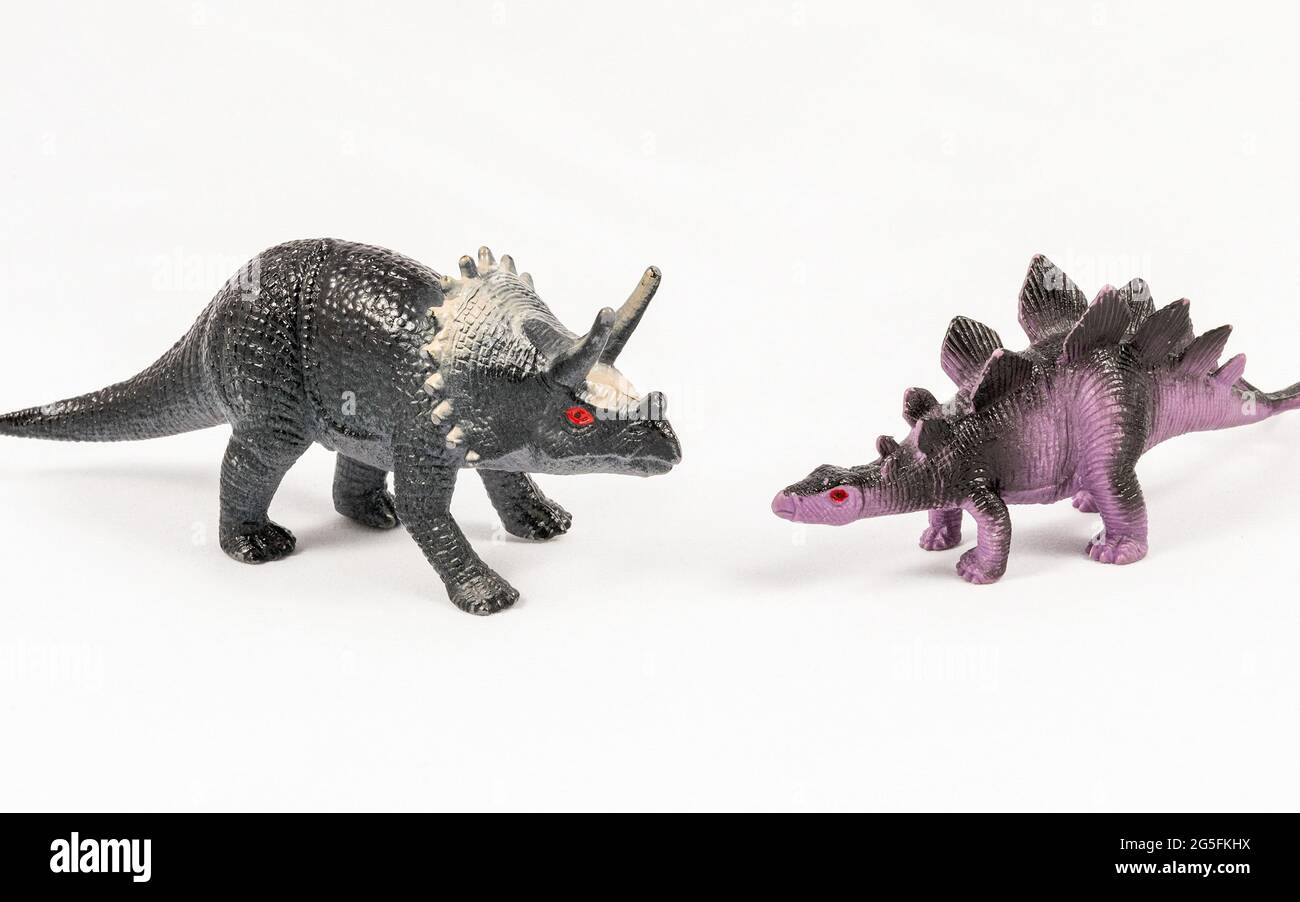 Stegosaurus and triceratops dinosaur toy models, isolated on white ...