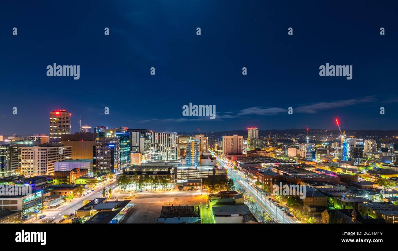Adelaide city skyline illuminated at night viewed towards hills, South ...