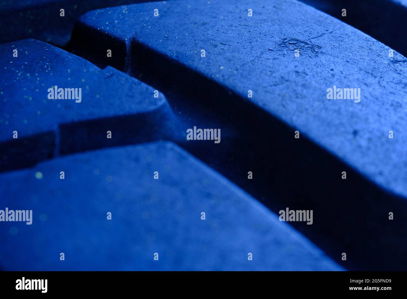 Abstract macro photography. Close up tire texture pattern with blue ...