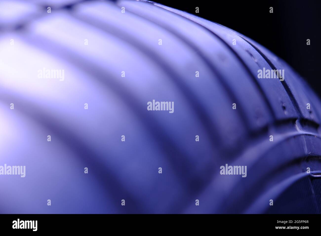 Abstract macro photography. Close up tire texture pattern with purple ...