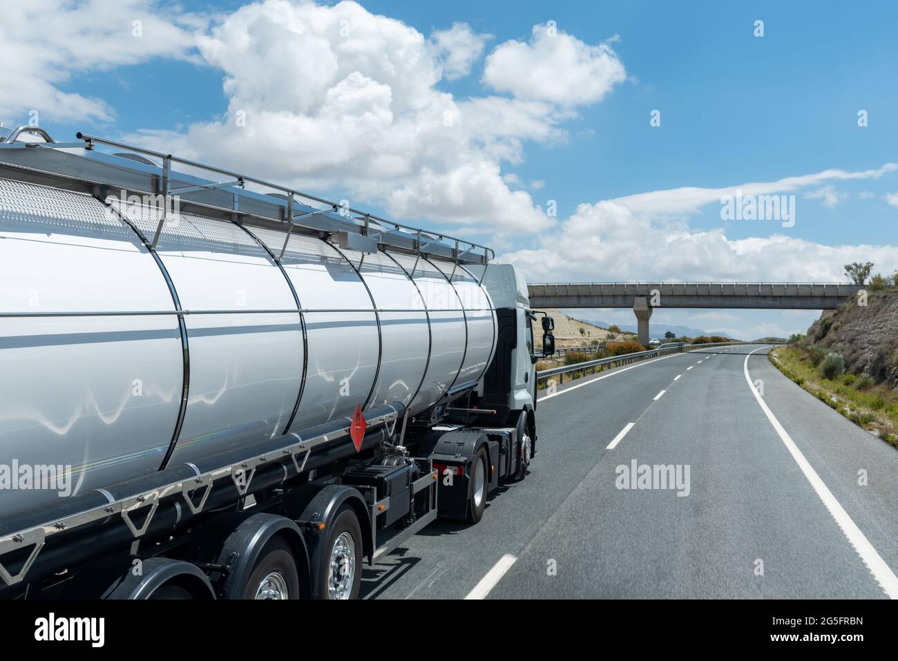 Tank truck with dangerous goods, danger from flammable liquids, driving ...
